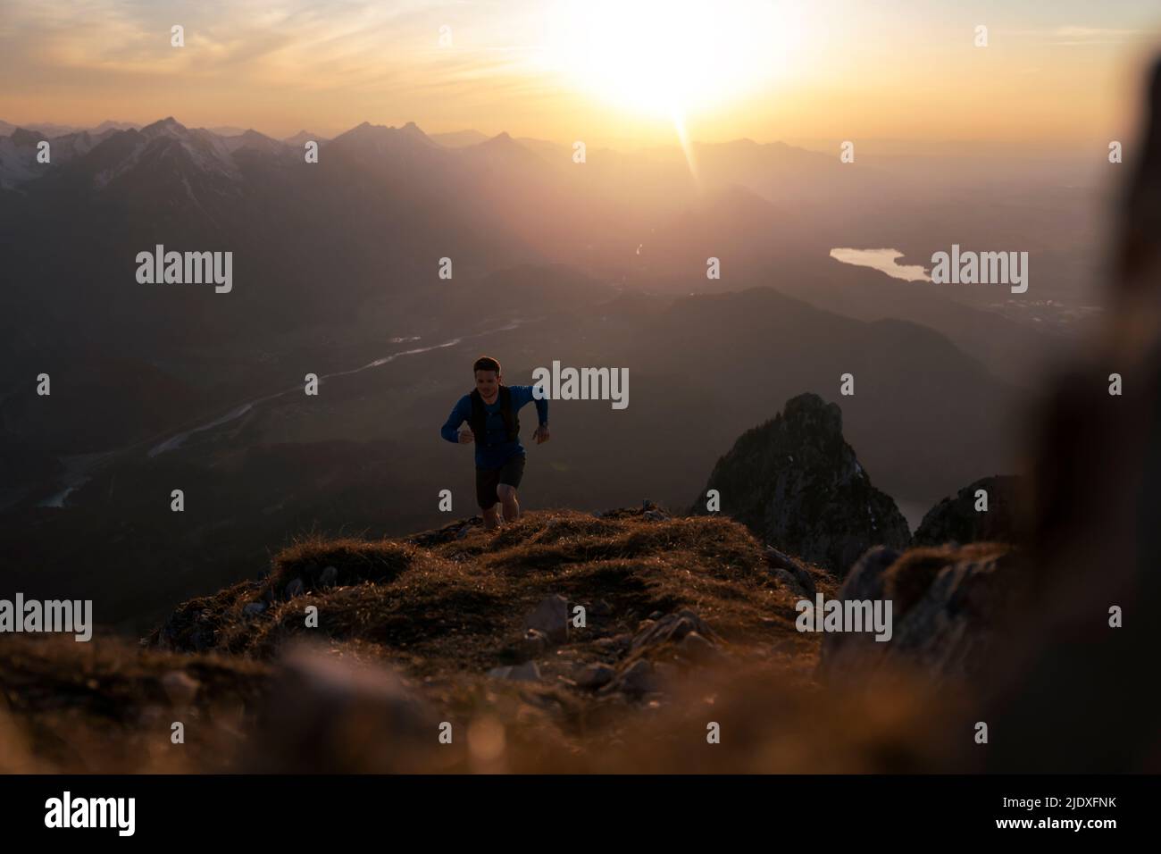 Hiking on mountain sunset hi-res stock photography and images - Alamy