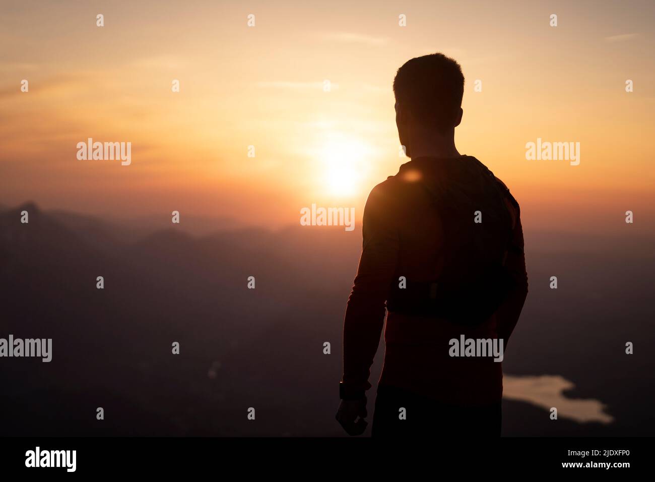 Silhouette of man looking at sunset hi-res stock photography and images ...