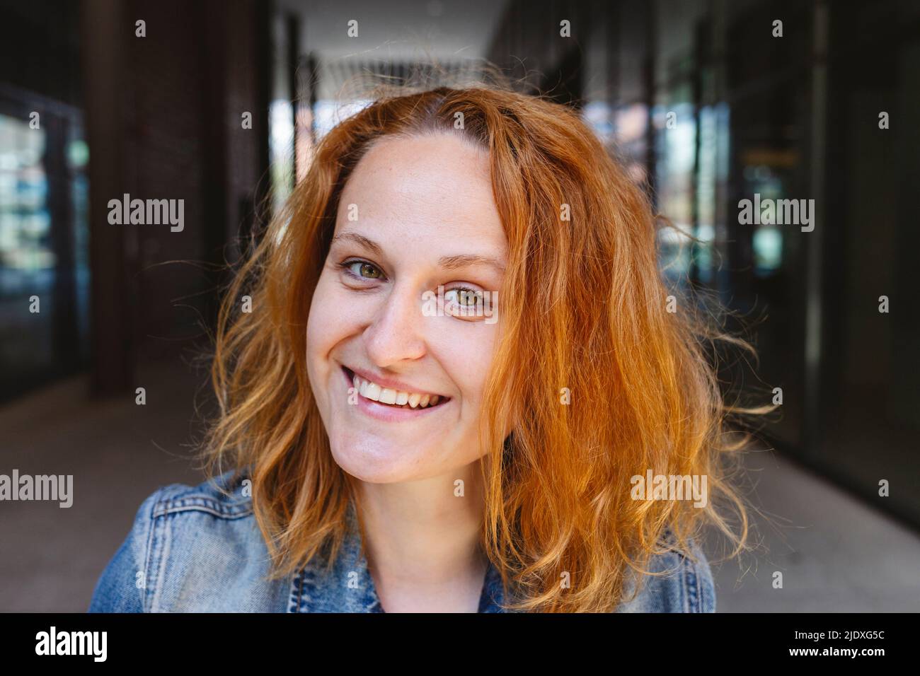 Woman standing in arcade hi-res stock photography and images - Alamy
