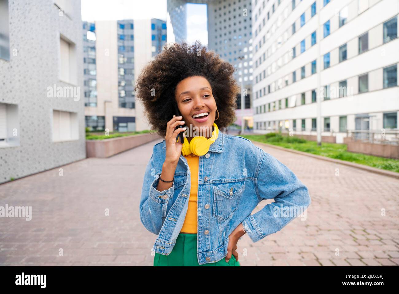 Standing communication architecture hand on hip hi-res stock ...