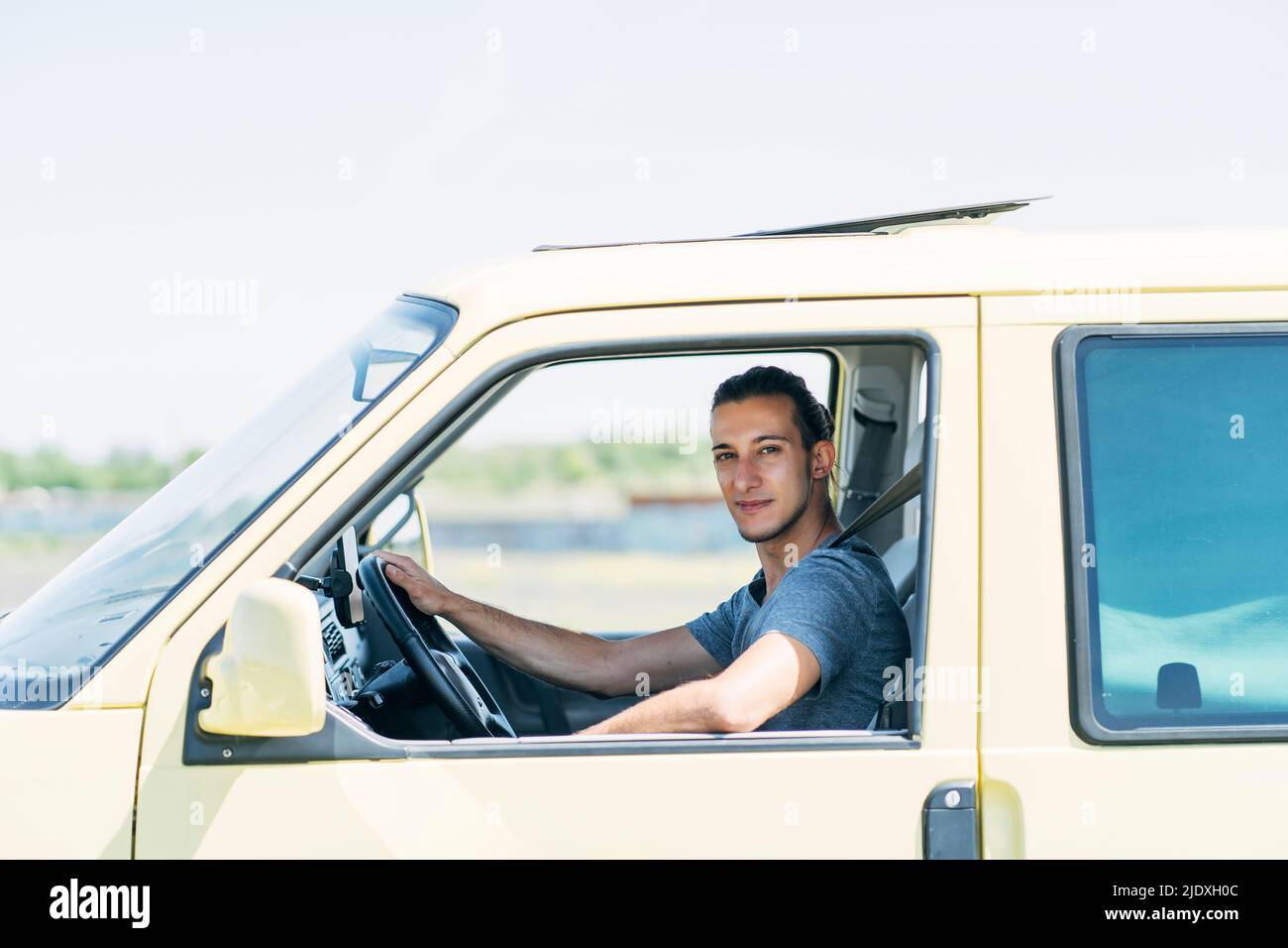 Portrait man sitting drivers seat hi-res stock photography and images ...