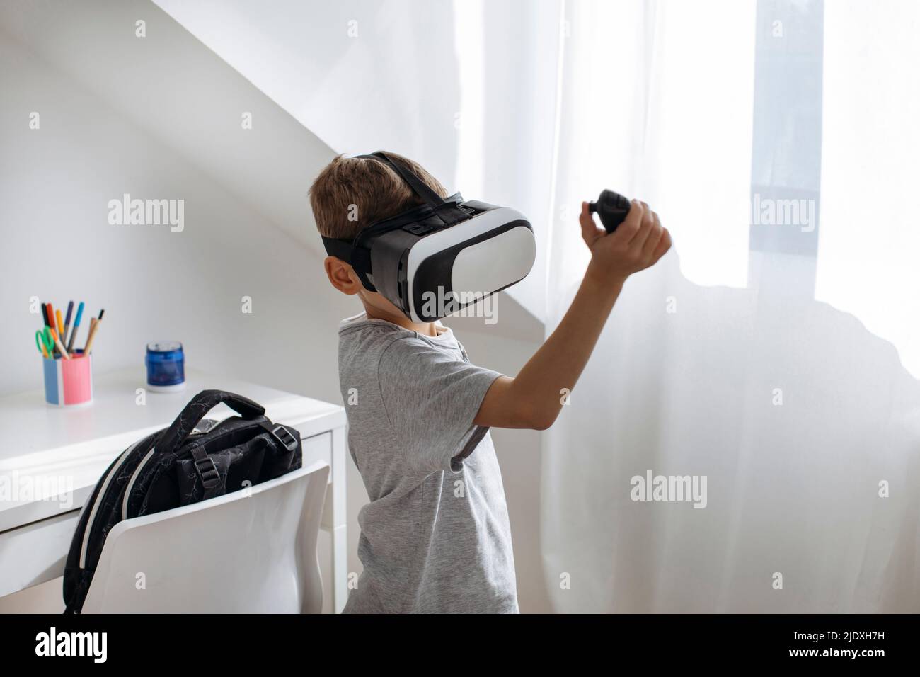 Person playing vr game hi-res stock photography and images - Alamy