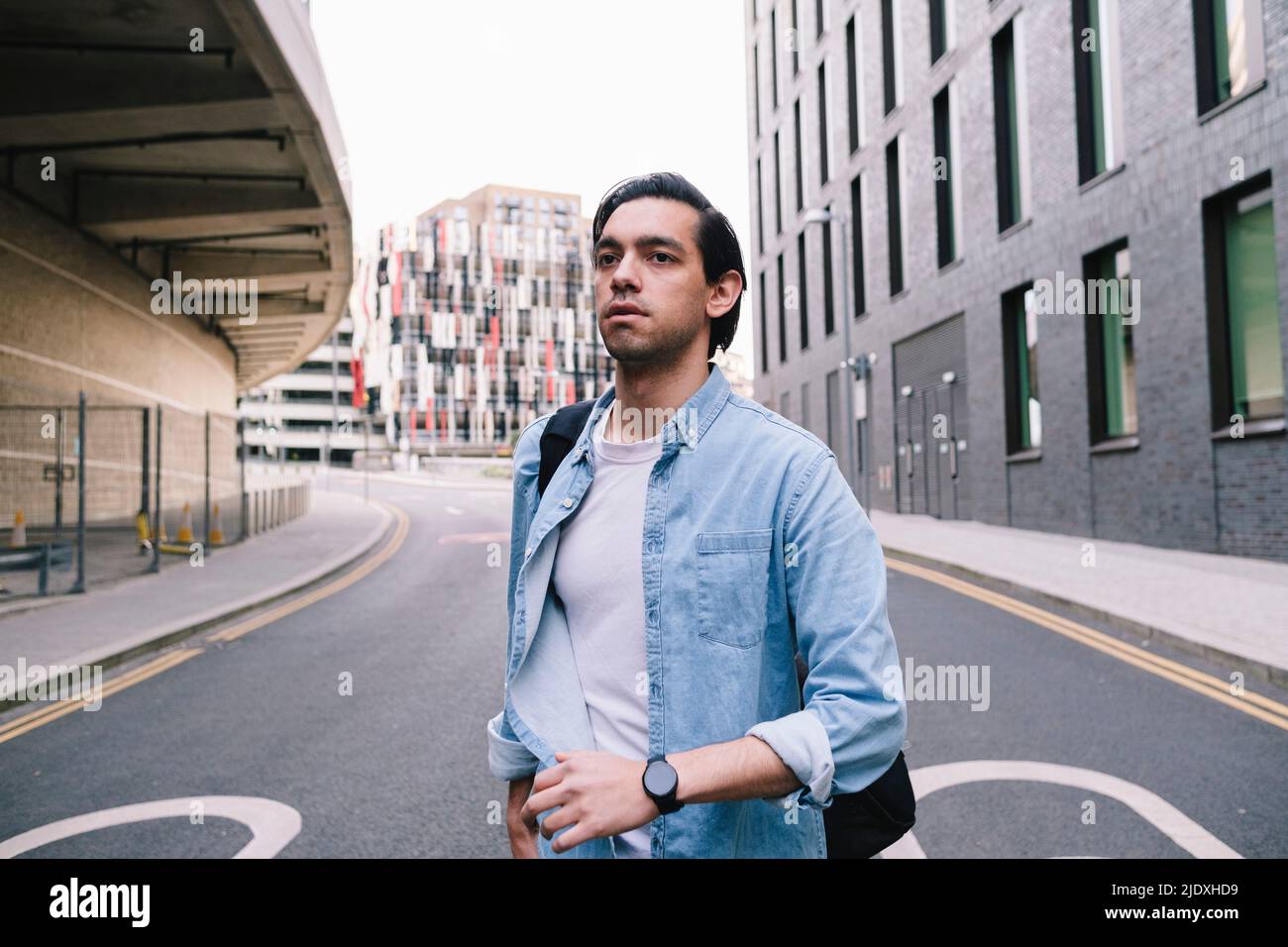 Businessman crossing hi-res stock photography and images - Alamy