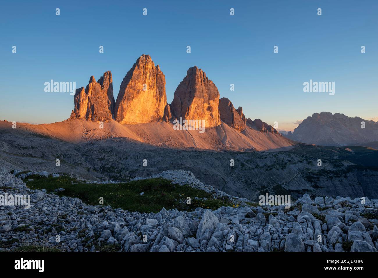 Italy, South Tyrol, Three Peaks of Lavaredo at dusk Stock Photo - Alamy
