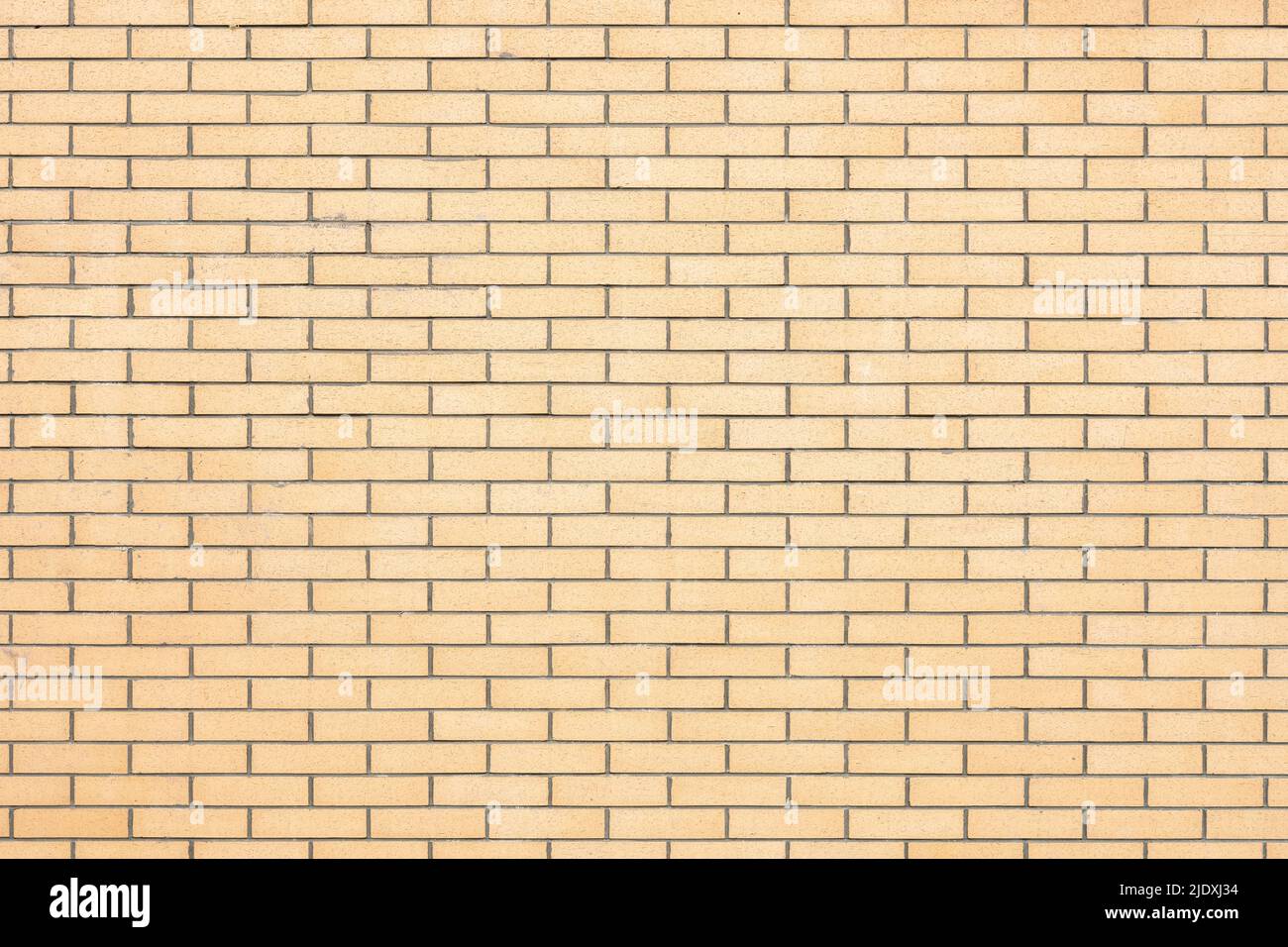 yellow brick wall at square format Stock Photo - Alamy