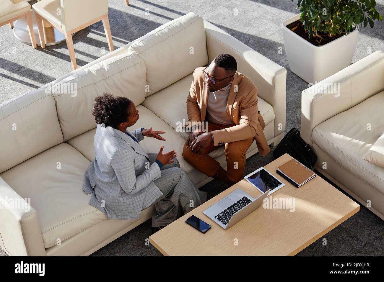 Businessman businesswoman laptop tablet modern office hi-res stock ...