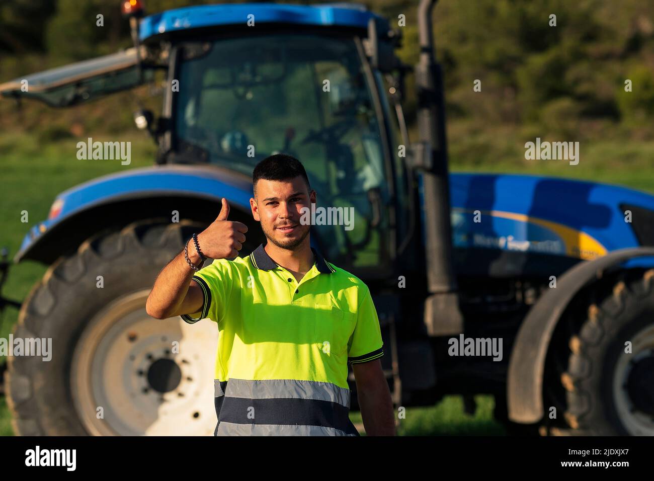Young farmer in uniform hi-res stock photography and images - Alamy