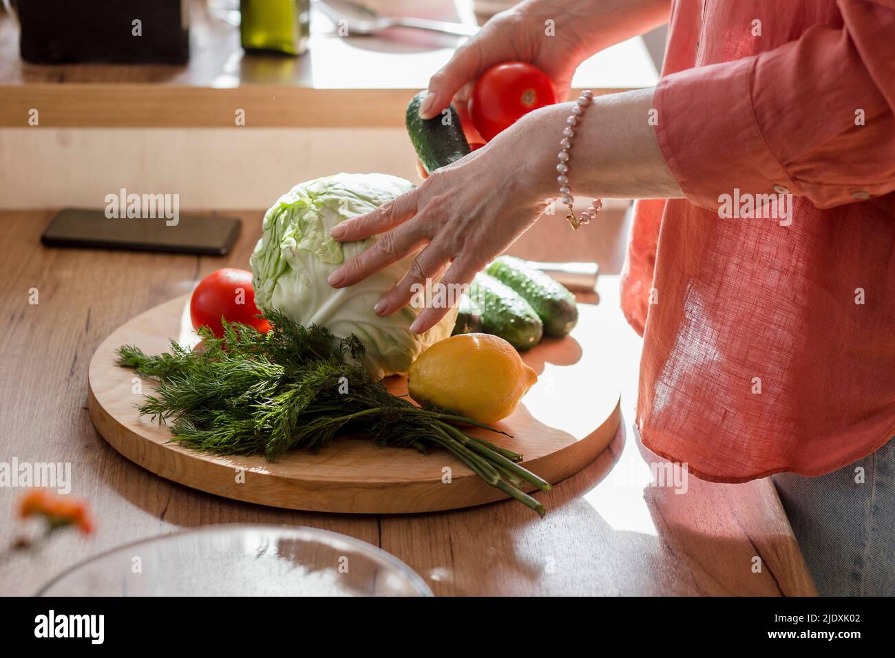 Woman sorting hi-res stock photography and images - Alamy