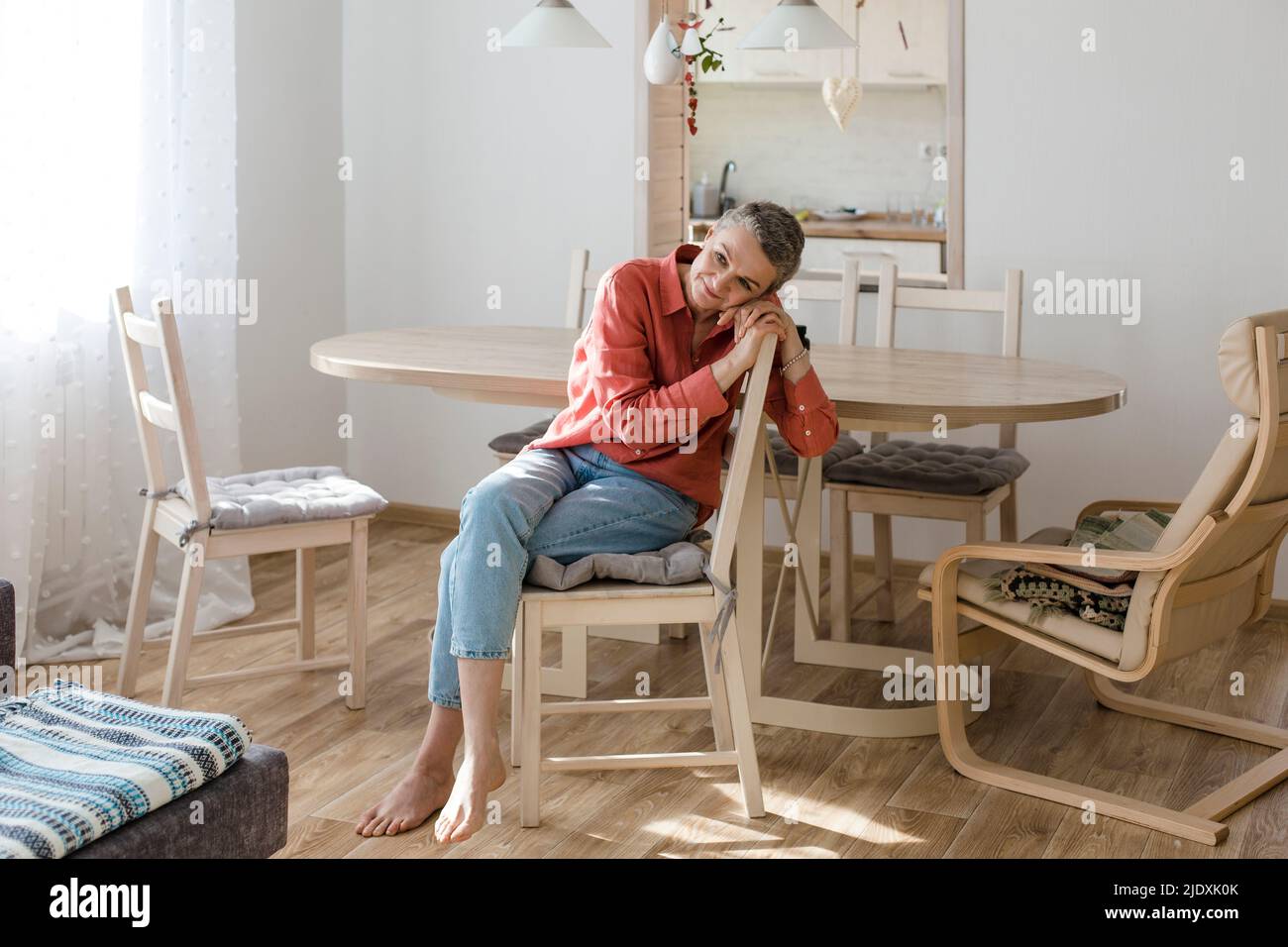 Wooden dining table legs hi-res stock photography and images - Alamy