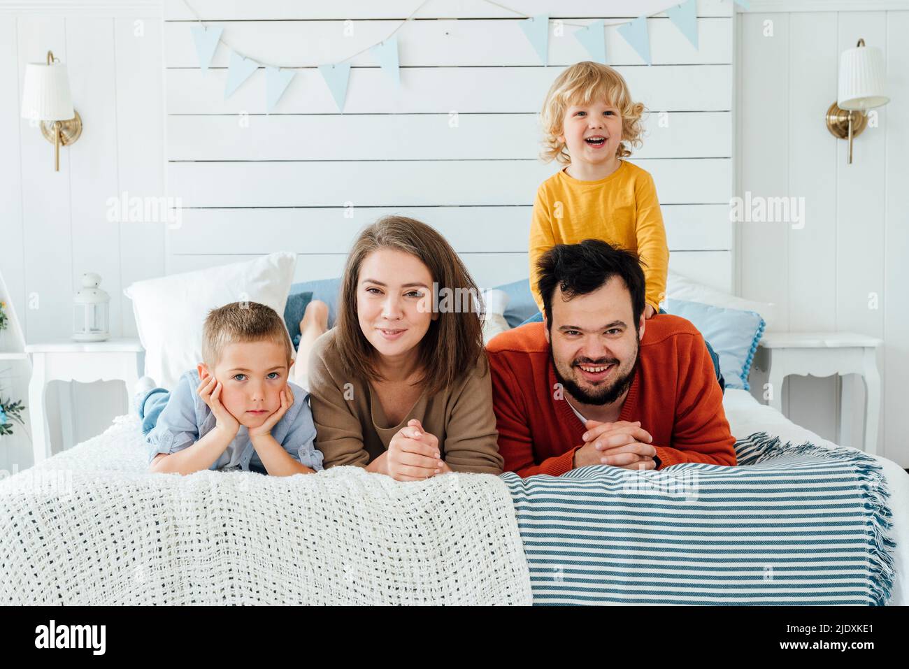 Happy family life parenting hi-res stock photography and images - Alamy