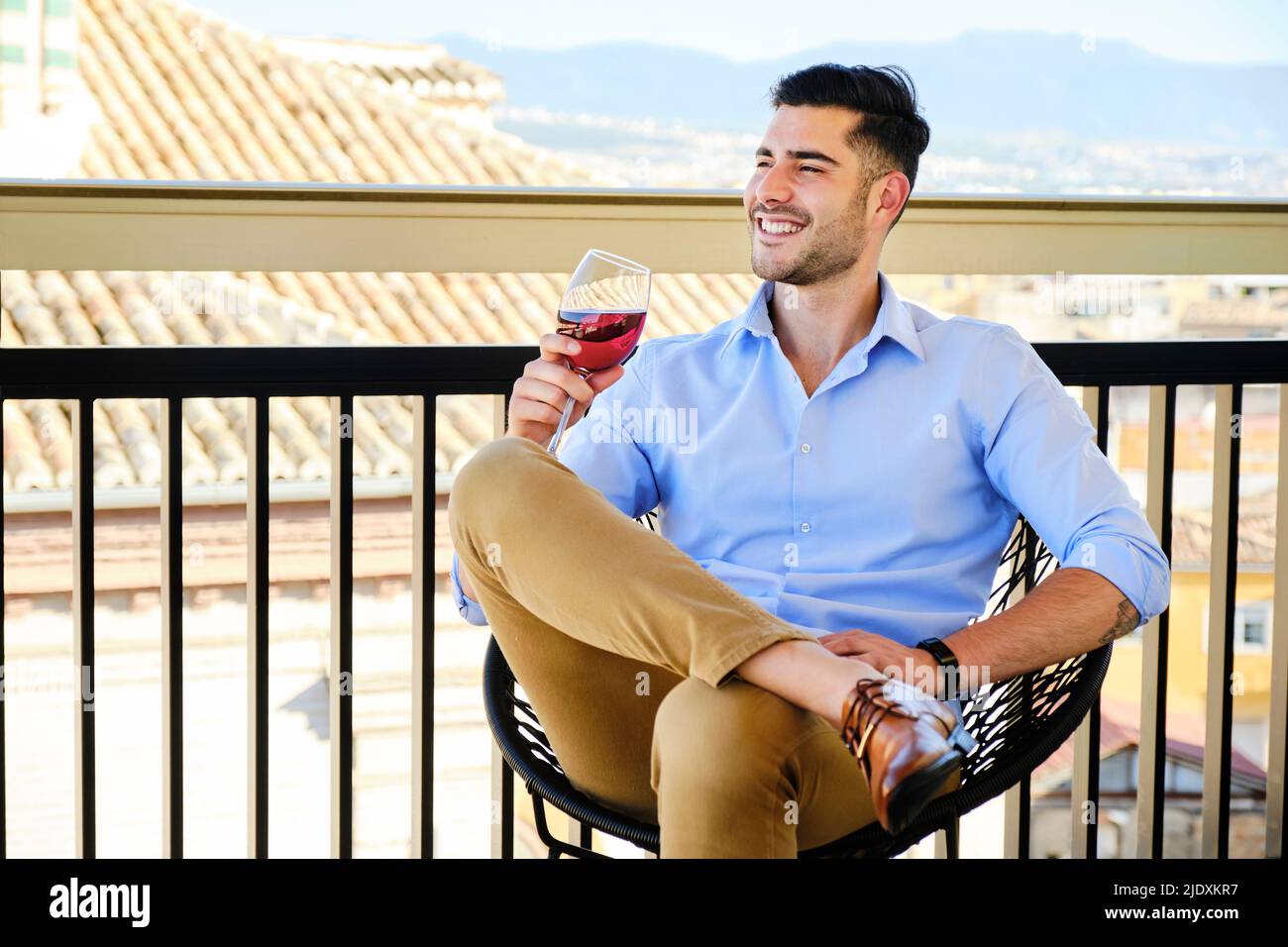 Black man on balcony hi-res stock photography and images - Alamy