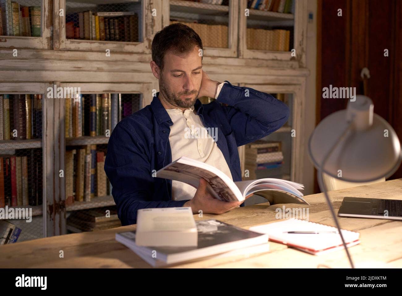 Interior man reading desk hi-res stock photography and images - Alamy
