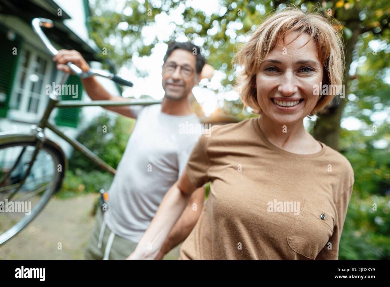 Man shoulder carrying woman hi-res stock photography and images - Alamy