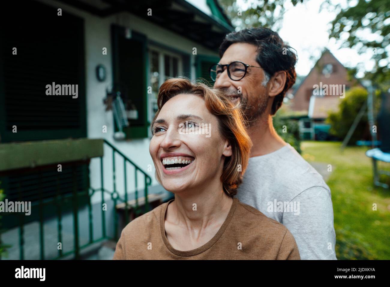 Back view cheerful woman hi-res stock photography and images - Alamy