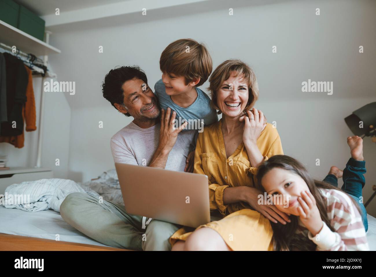 Happy family having fun at home Stock Photo - Alamy