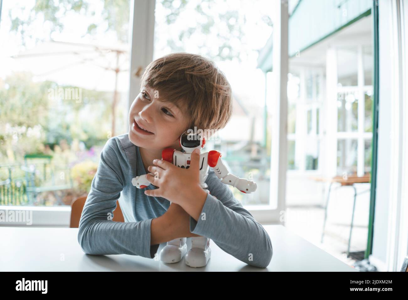 Happy boy toy robot hi-res stock photography and images - Alamy