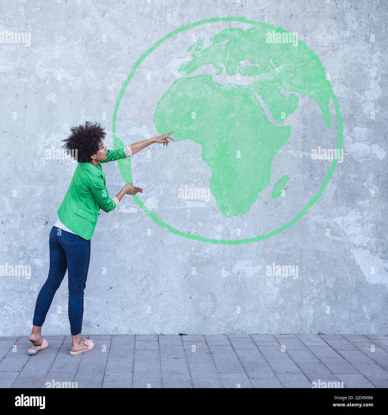 Person looking at world globe hi-res stock photography and images - Alamy