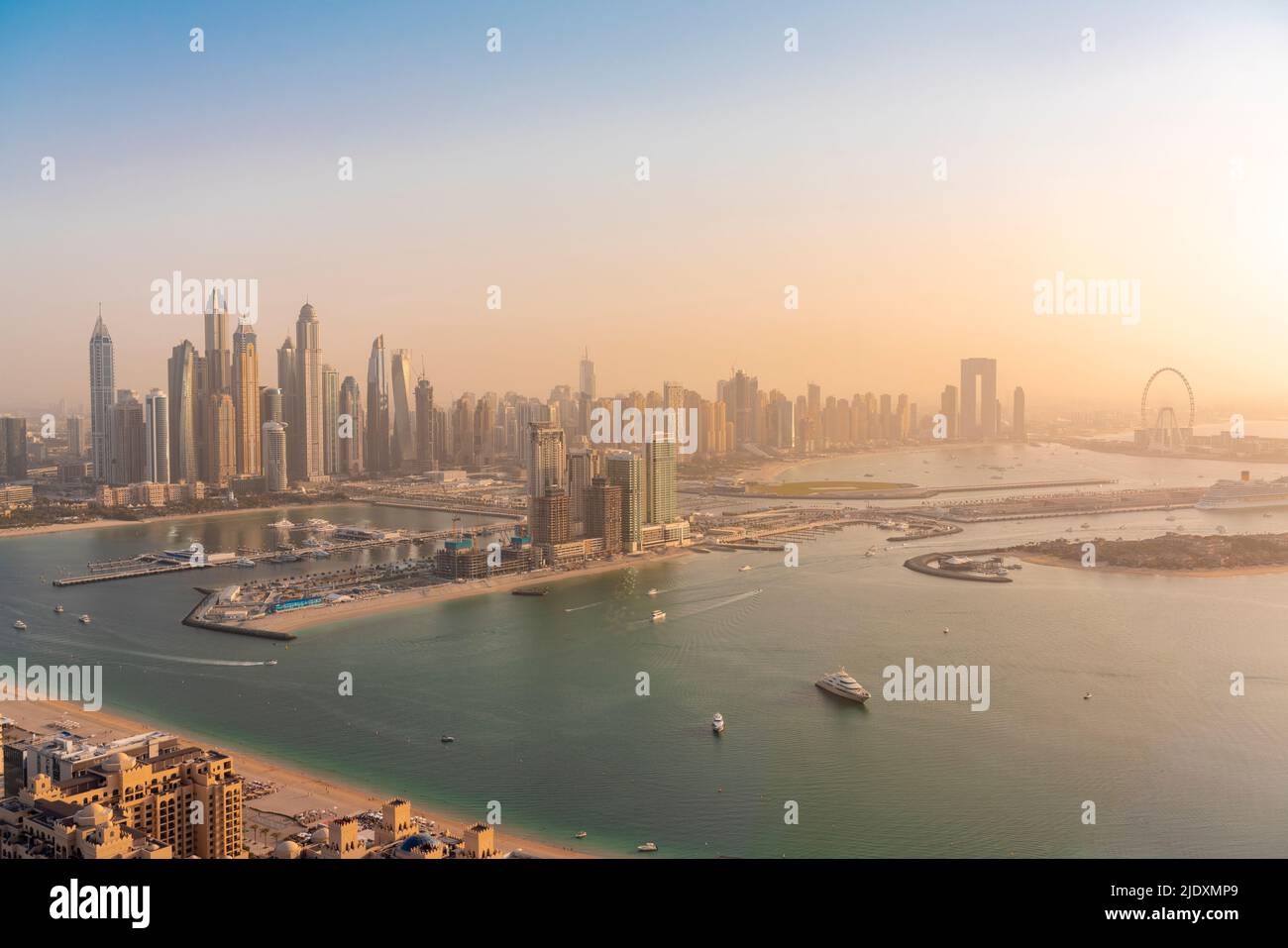United Arab Emirates, Dubai, View of coastal city at sunset Stock Photo ...