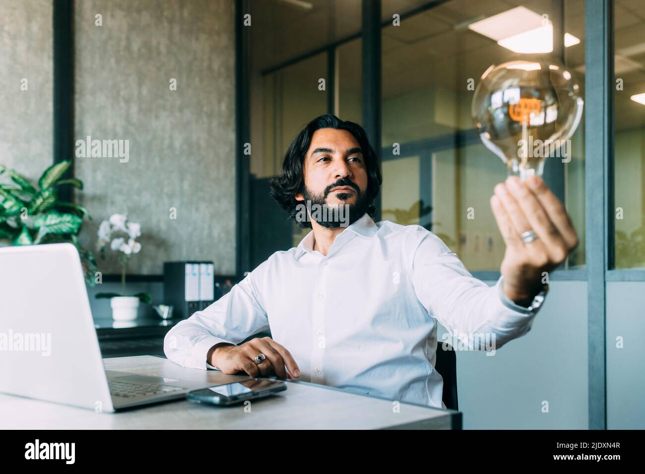 Businessman bulb hi-res stock photography and images - Alamy