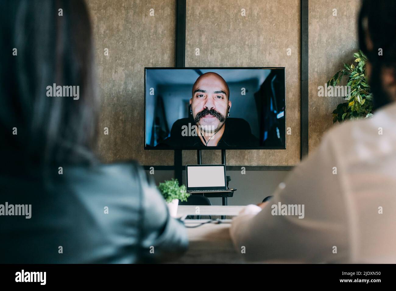 Business people talking video call hi-res stock photography and images ...