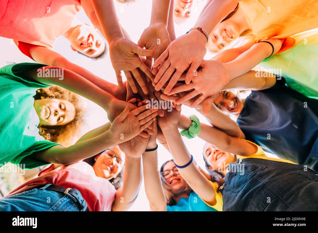 Multi ethnic hands stacked hi-res stock photography and images - Alamy
