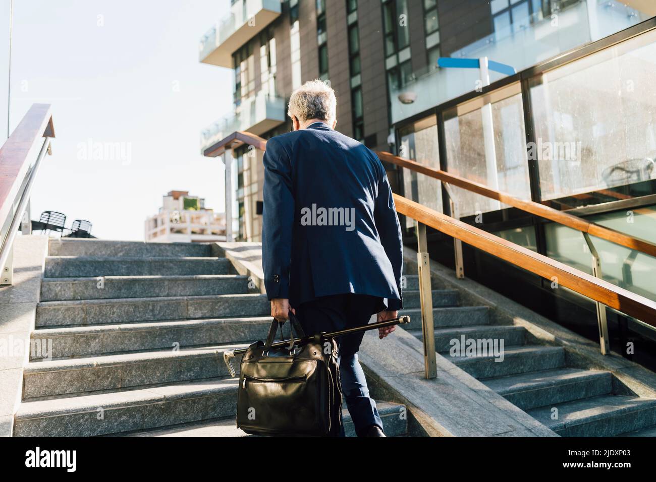 Senior man walking outside hi-res stock photography and images - Alamy