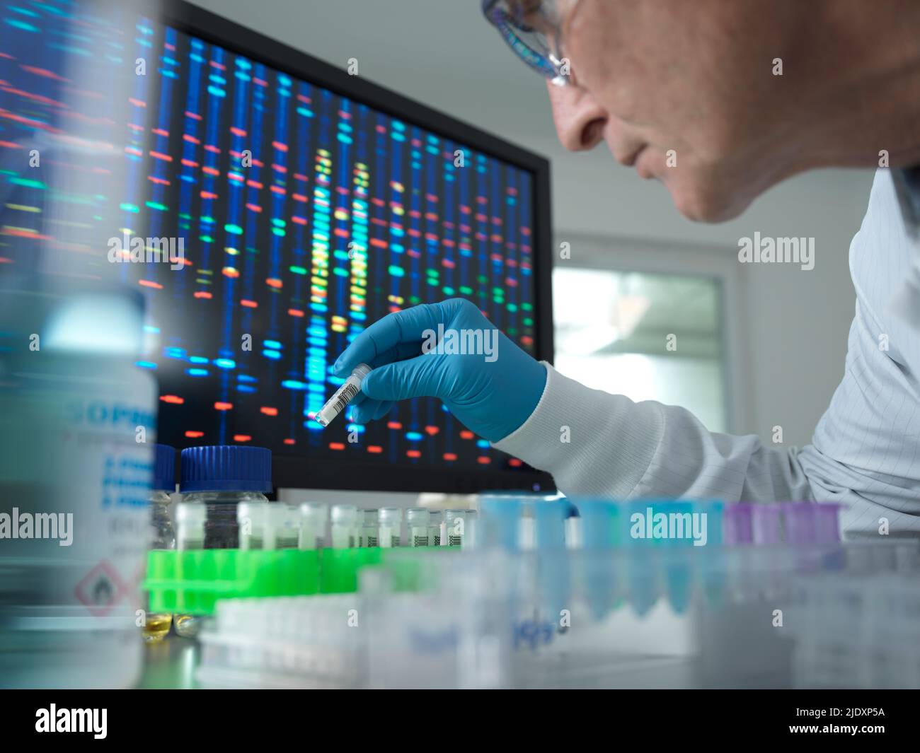 Scientist holding test tube sample analyzing in laboratory Stock Photo ...