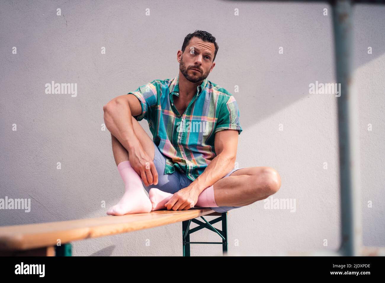 Image tired man sitting on hi-res stock photography and images - Alamy