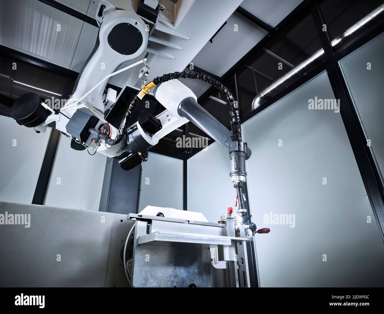 Robotic arm in manufacturing industry Stock Photo - Alamy