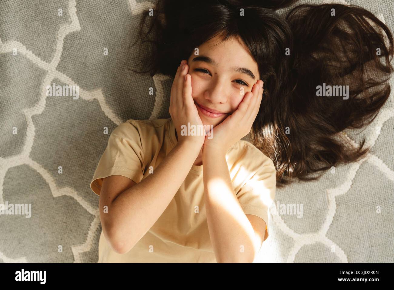 Female resting chin on hand hi-res stock photography and images - Alamy