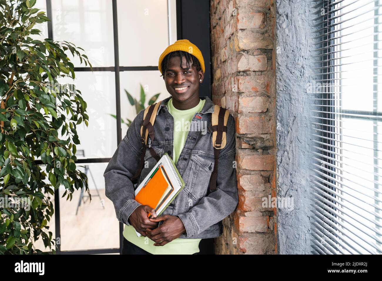 Male student wall on hi-res stock photography and images - Alamy