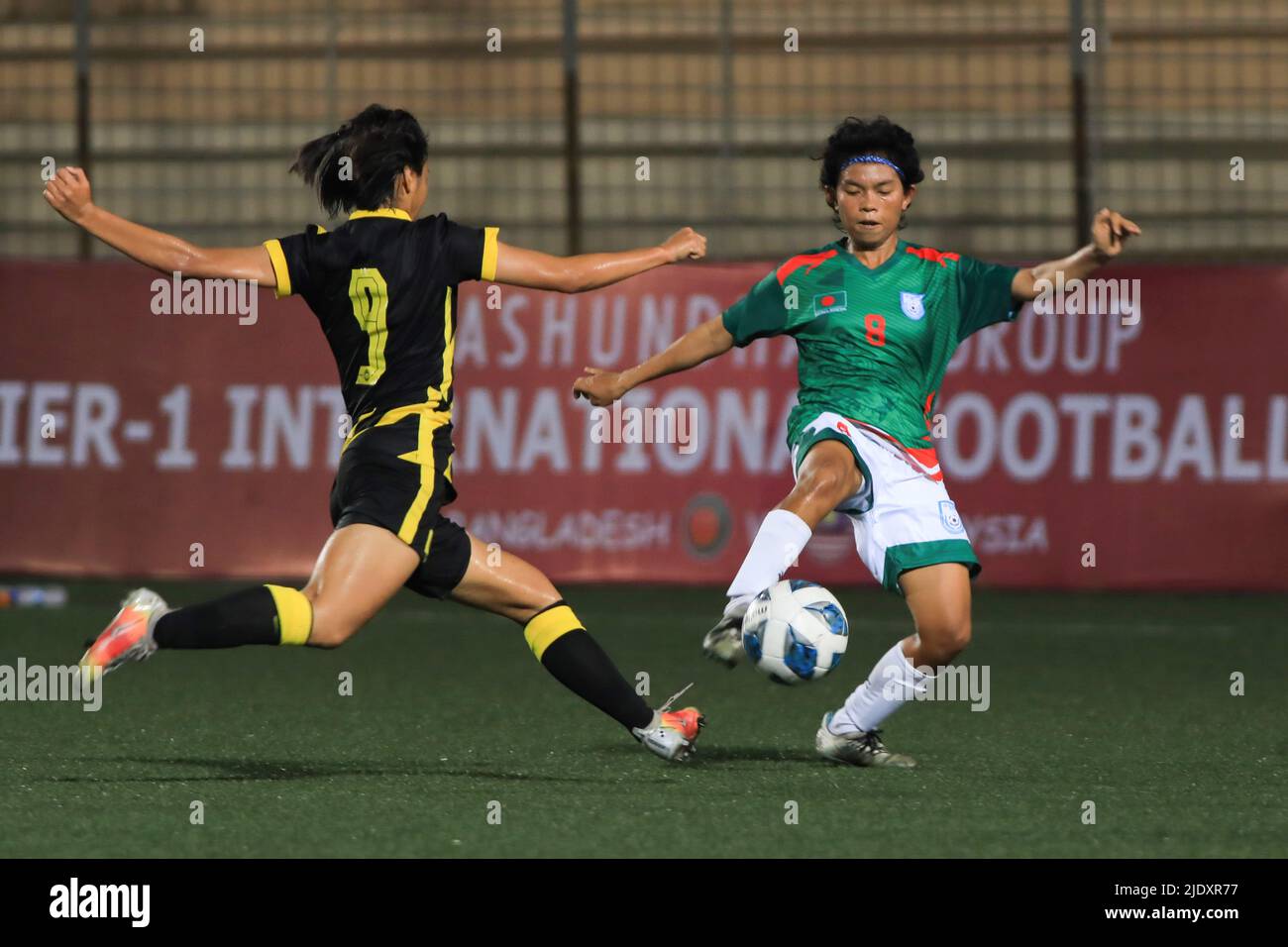 Dhaka, Bangladesh. 23rd June, 2022. Maria Manda (8) of Team Bangladesh and Jessica Susanne (9 ...
