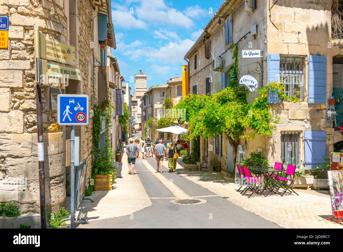 One of the many typical streets and alleys of colorful sidewalk cafes ...