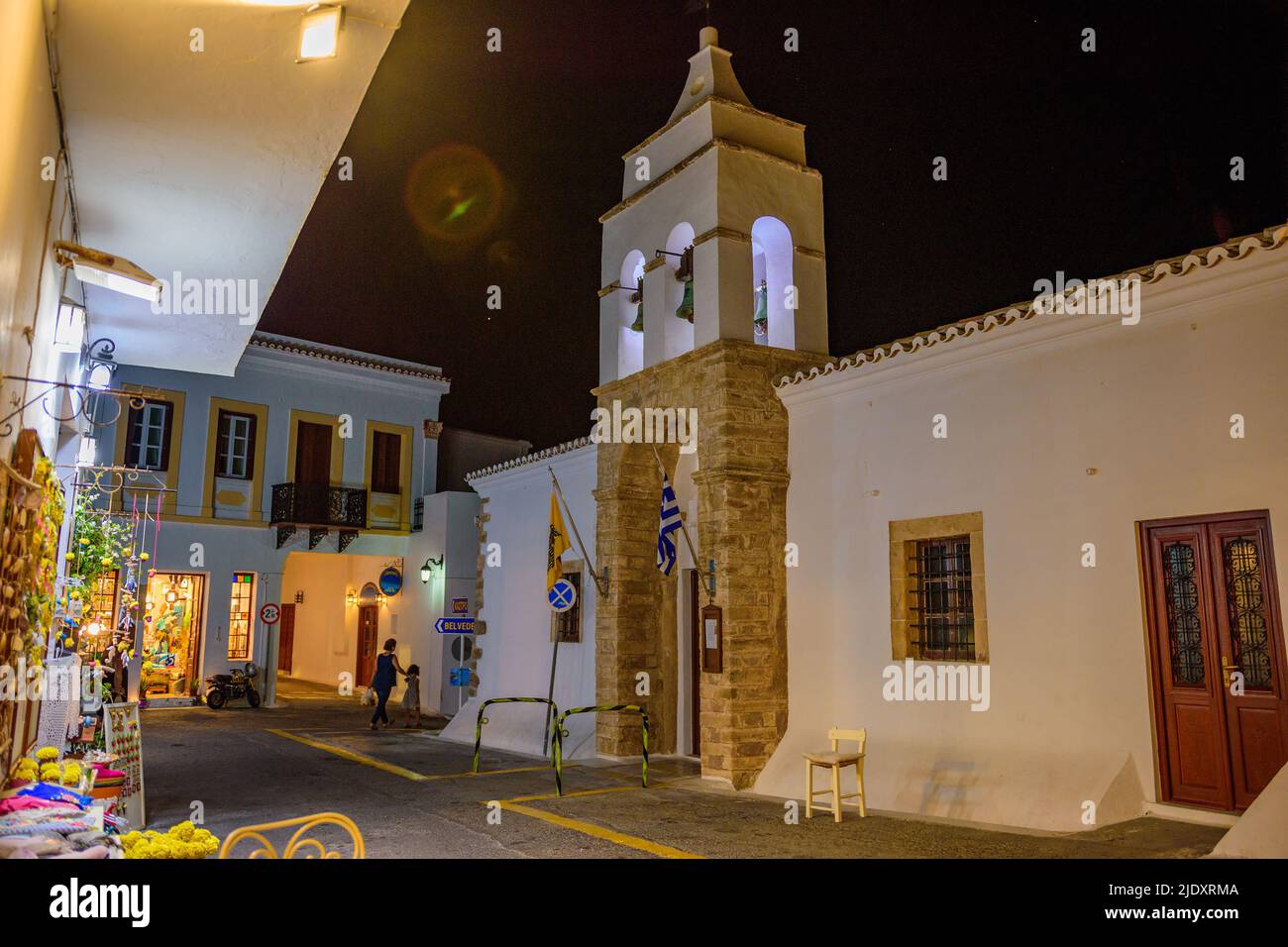 Architectural buildings with people walking in the streets of Chora ...