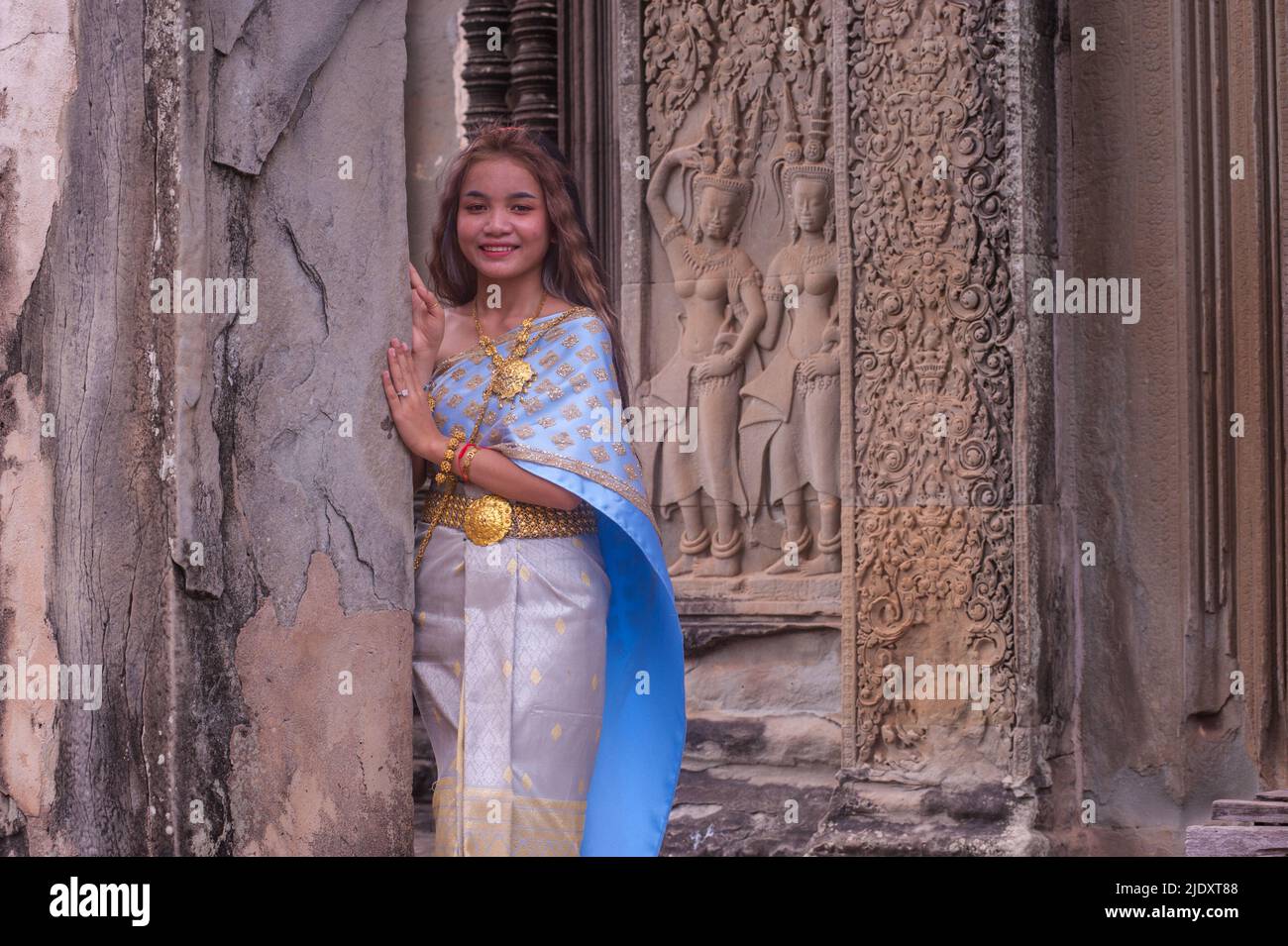 Beautiful Cambodian woman in traditional clothing at Angkor Wat, Angkor ...