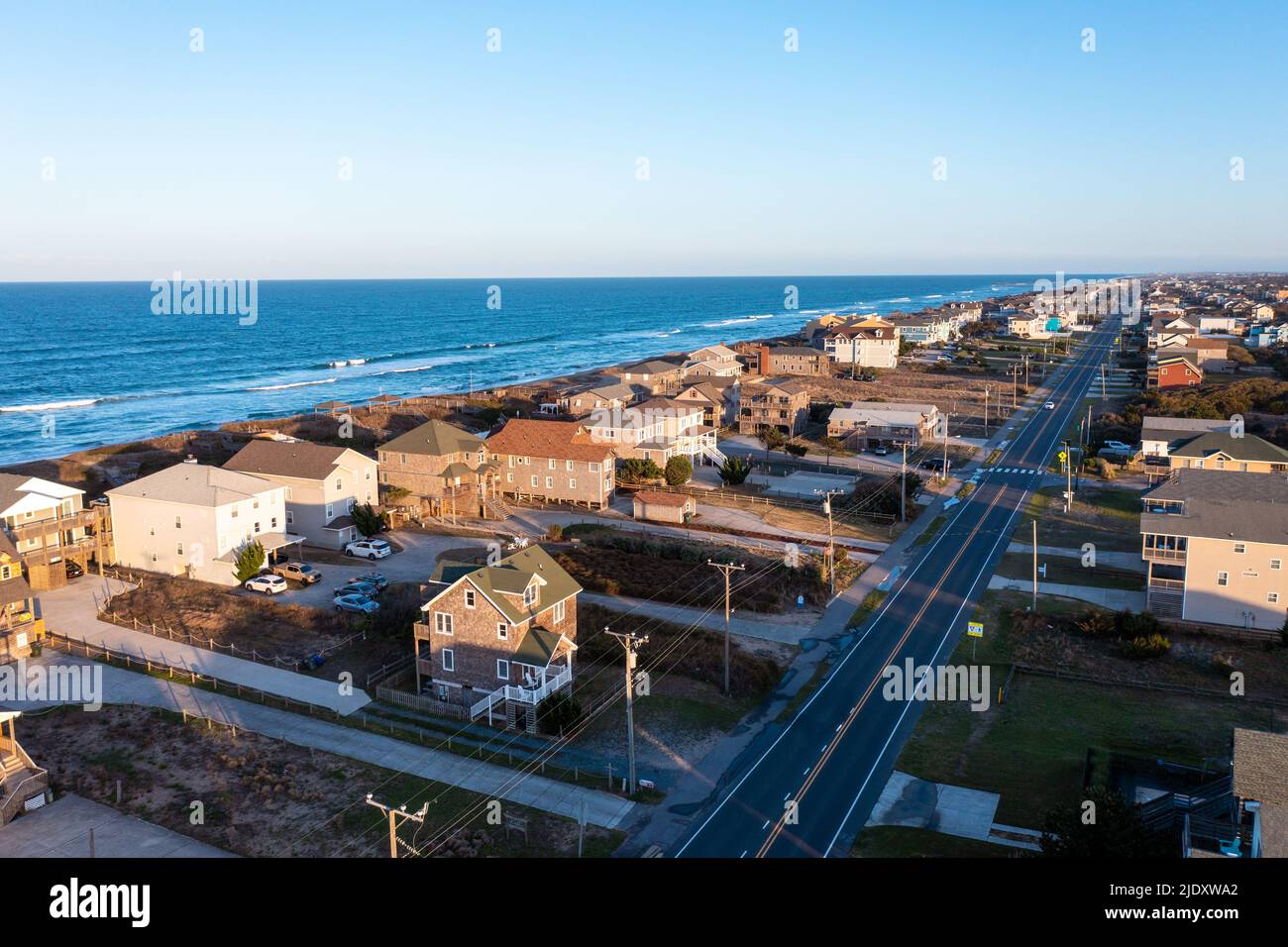 Aerial View of homes and the beach during golden hour in Nags Head ...