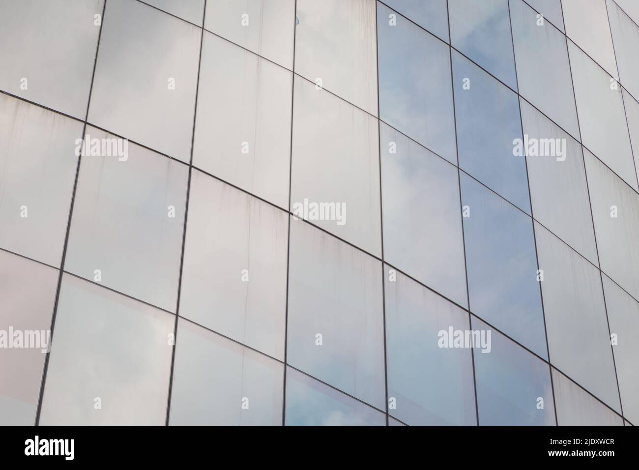 Blue glass of windows building background Stock Photo - Alamy