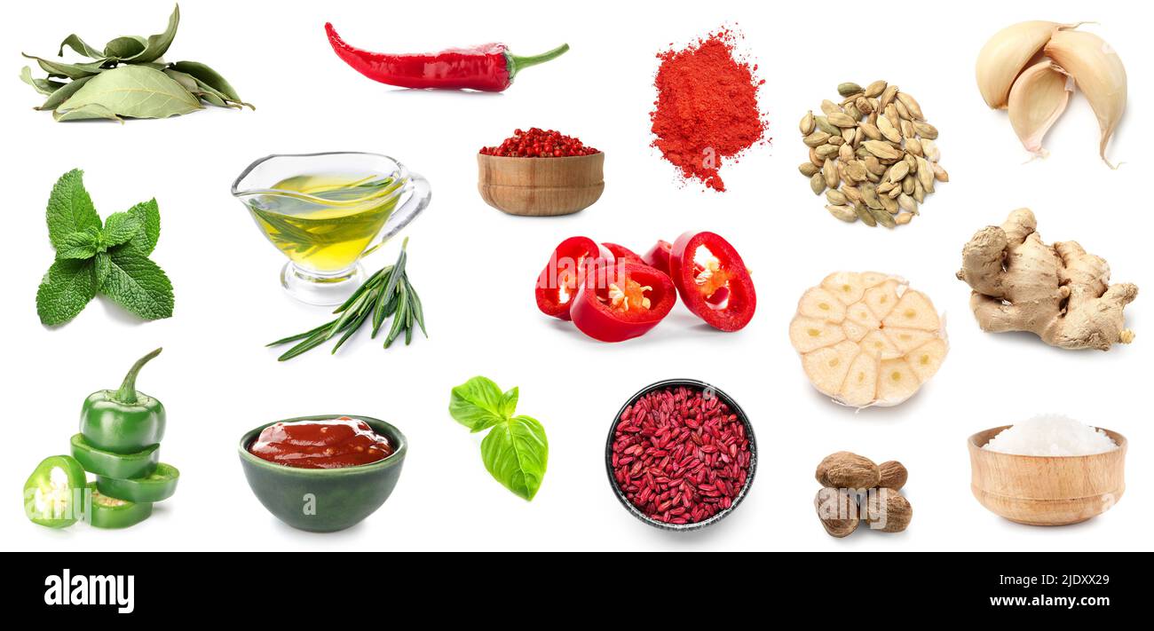 Set of aromatic spices with fresh vegetables, herbs, oil and sauce on ...