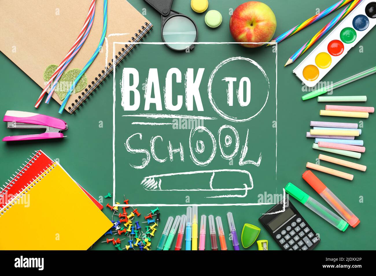 Text BACK TO SCHOOL and set of stationery on chalkboard Stock Photo - Alamy