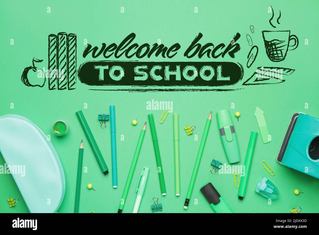Text WELCOME BACK TO SCHOOL and set of stationery on green background ...
