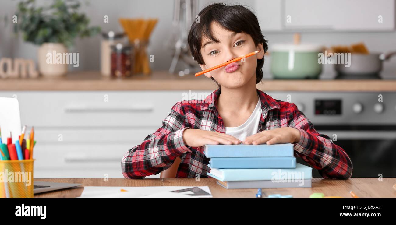 Primary child homework kitchen hi-res stock photography and images - Alamy