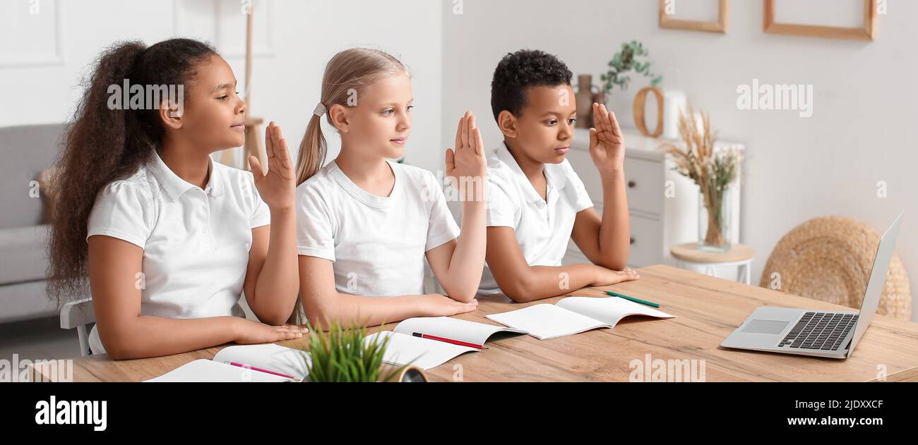 Little children studying online at home Stock Photo - Alamy