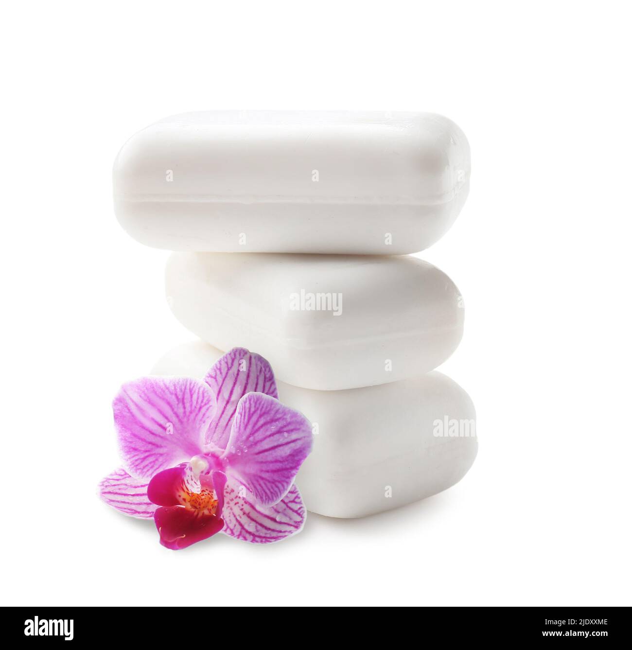 Stack of soap bars and orchid flower on white background Stock Photo ...