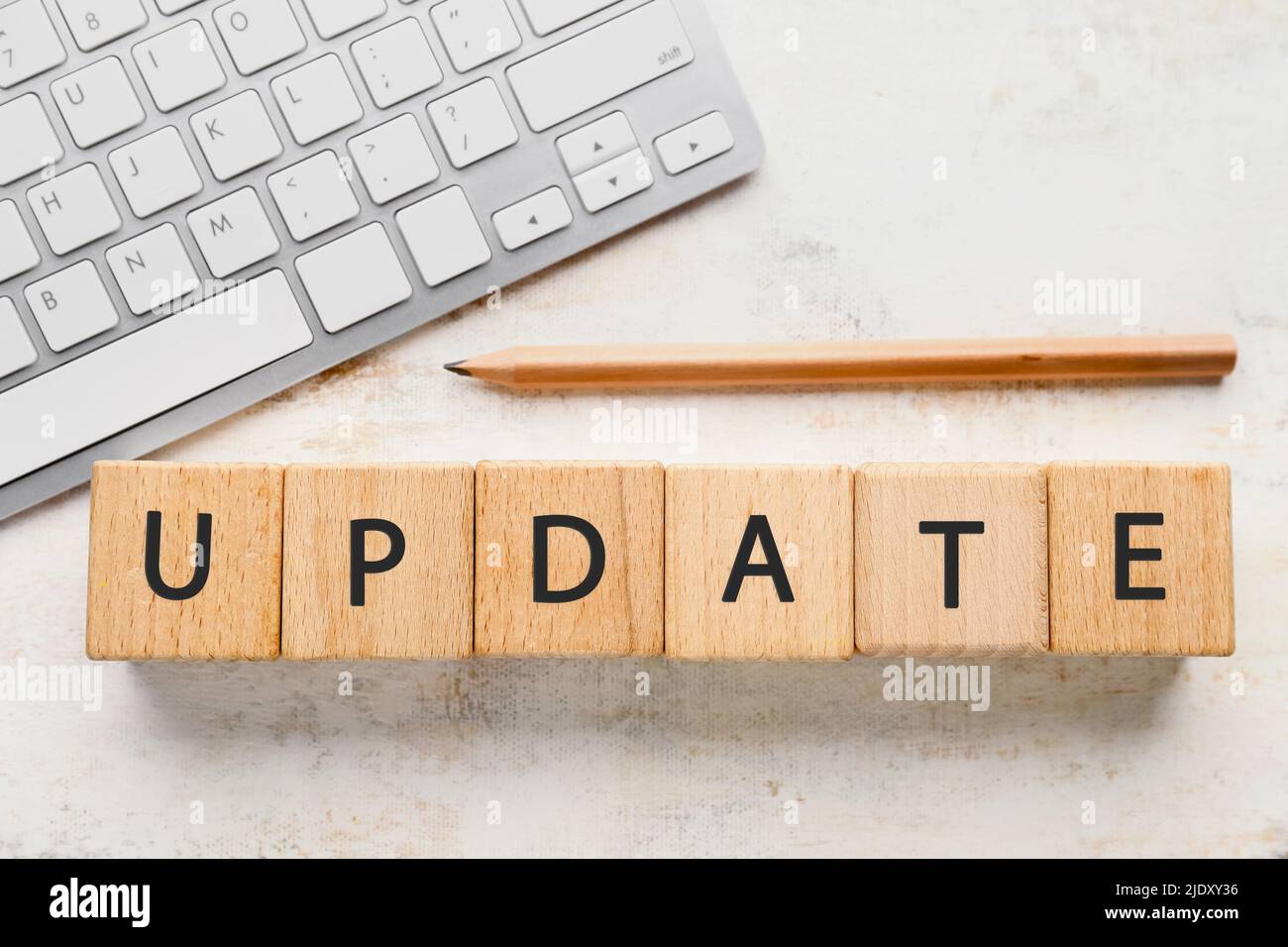 Word UPDATE made of cubes and PC keyboard on light background Stock ...