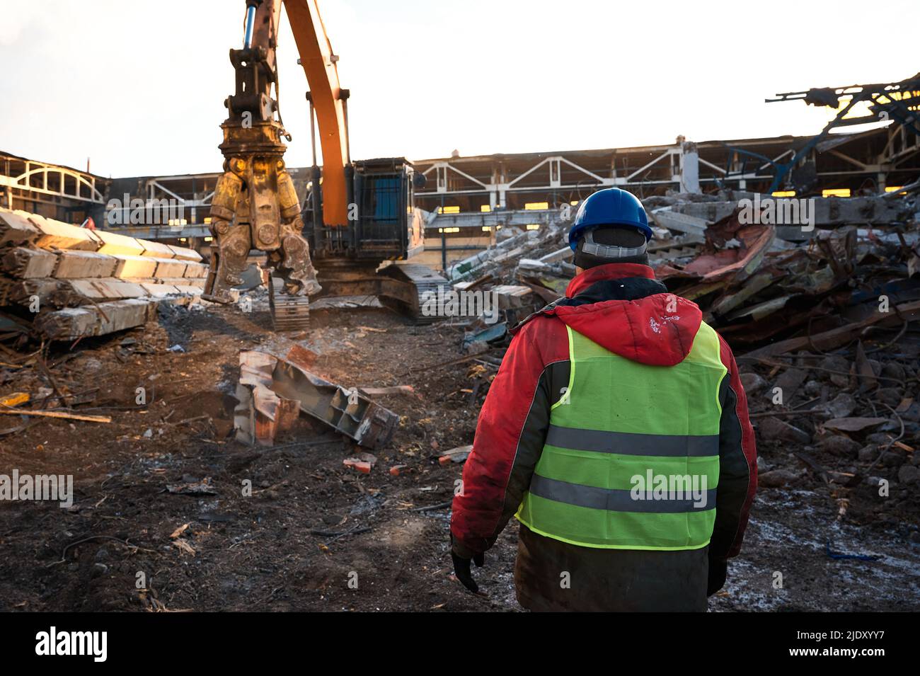 Hydraulic excavator removes concrete hi-res stock photography and ...