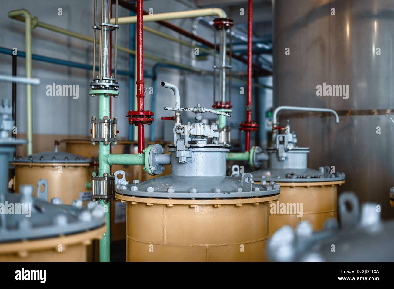 Modern sand and coal filtration columns with red pipelines Stock Photo ...