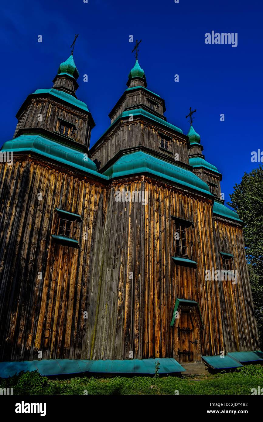 The triple chapel wooden church Stock Photo - Alamy