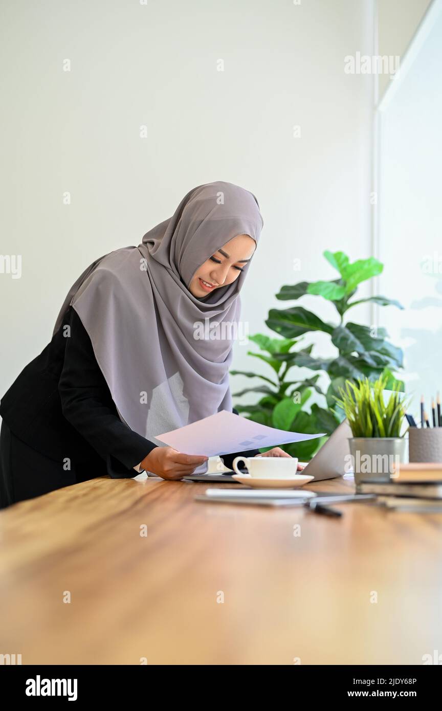 Professional muslim businesswoman or muslim female accountant wearing ...