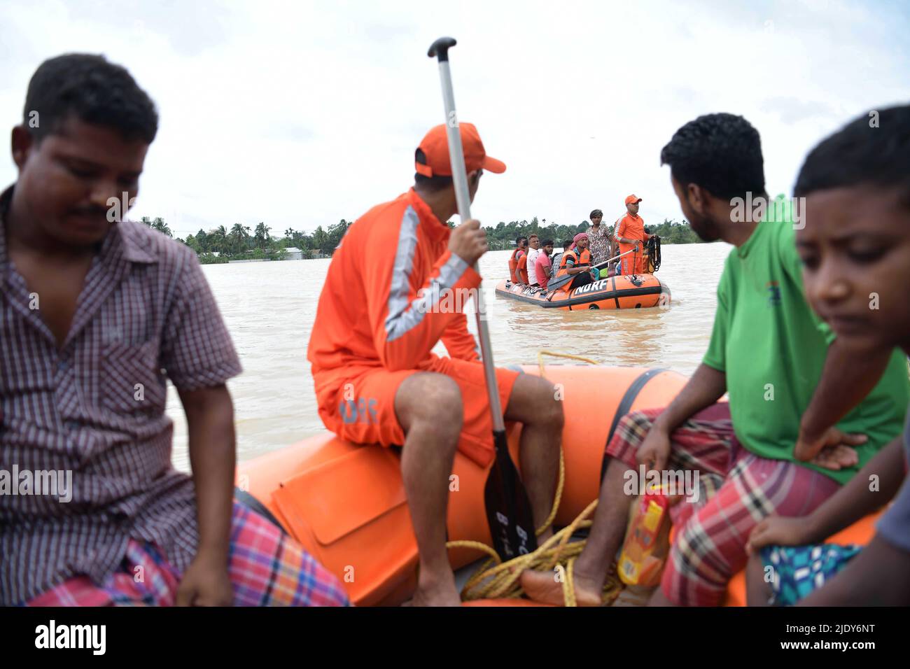 The NDRF (National Disaster Response Force) personnel rescue people ...