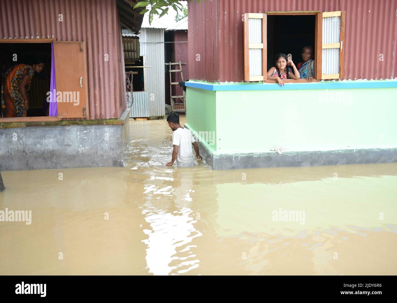 People are waiting at their homes to get rescued by the NDRF (National Disaster Response Force ...